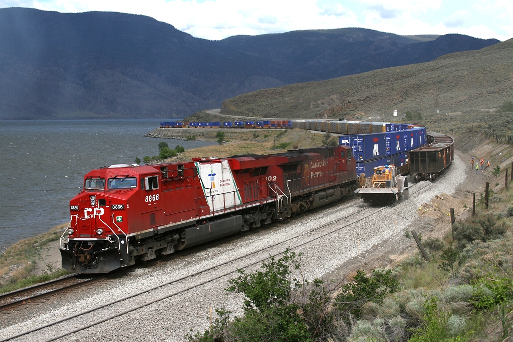 Railpictures.ca - Rob Eull Photo: A rainshower falls on Lake Kamloops as the work train stops ...