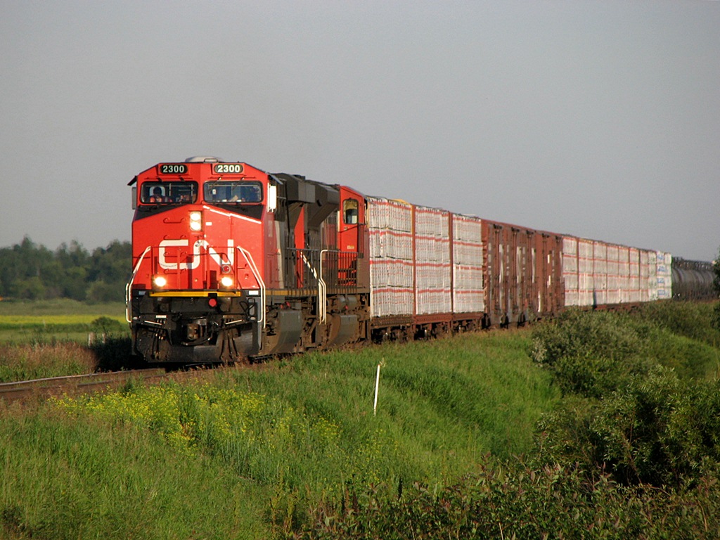 Railpictures.ca - CalMurray Photo: Then new CN 2300 leads M346 into Rivers with a good friend as ...