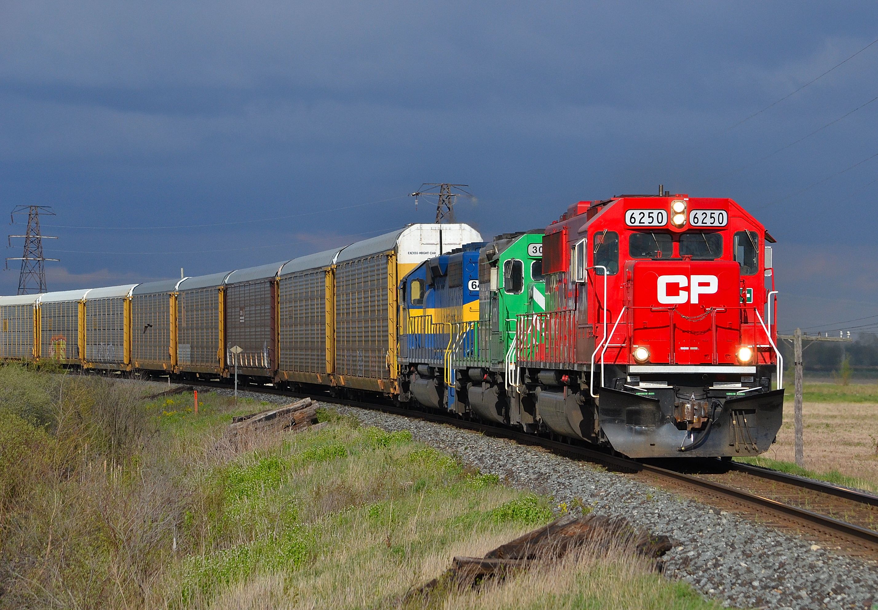 Railpictures.ca - Jay Butler Photo: CP 147 led by a colourful EMD lashup, heads westbound as it ...