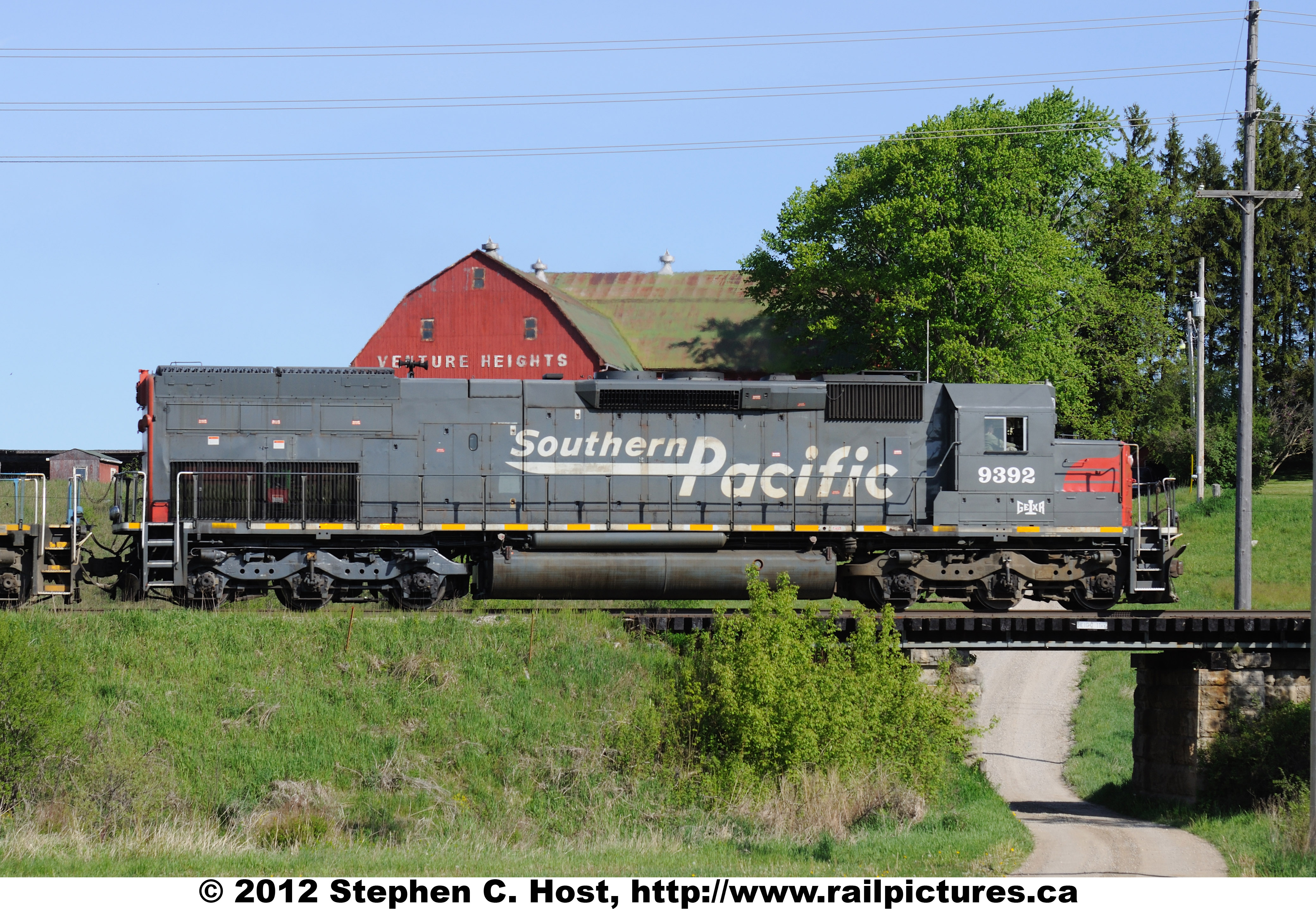 Railpictures.ca - Stephen C. Host Photo: SP 9392… wait, GEXR 9392 east is passing a farm just ...
