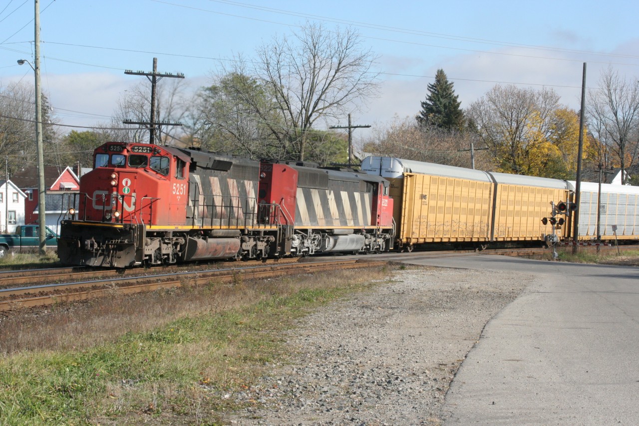 Railpictures.ca - Kevin Flood Photo: A CN wide cab SD40-2 leads a westbound over the grade ...