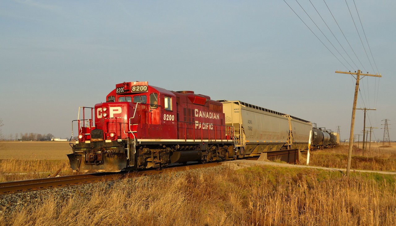 Railpictures.ca - Jay Butler Photo: CP T76 with GP9u 8200 running solo, rounds the bend into ...