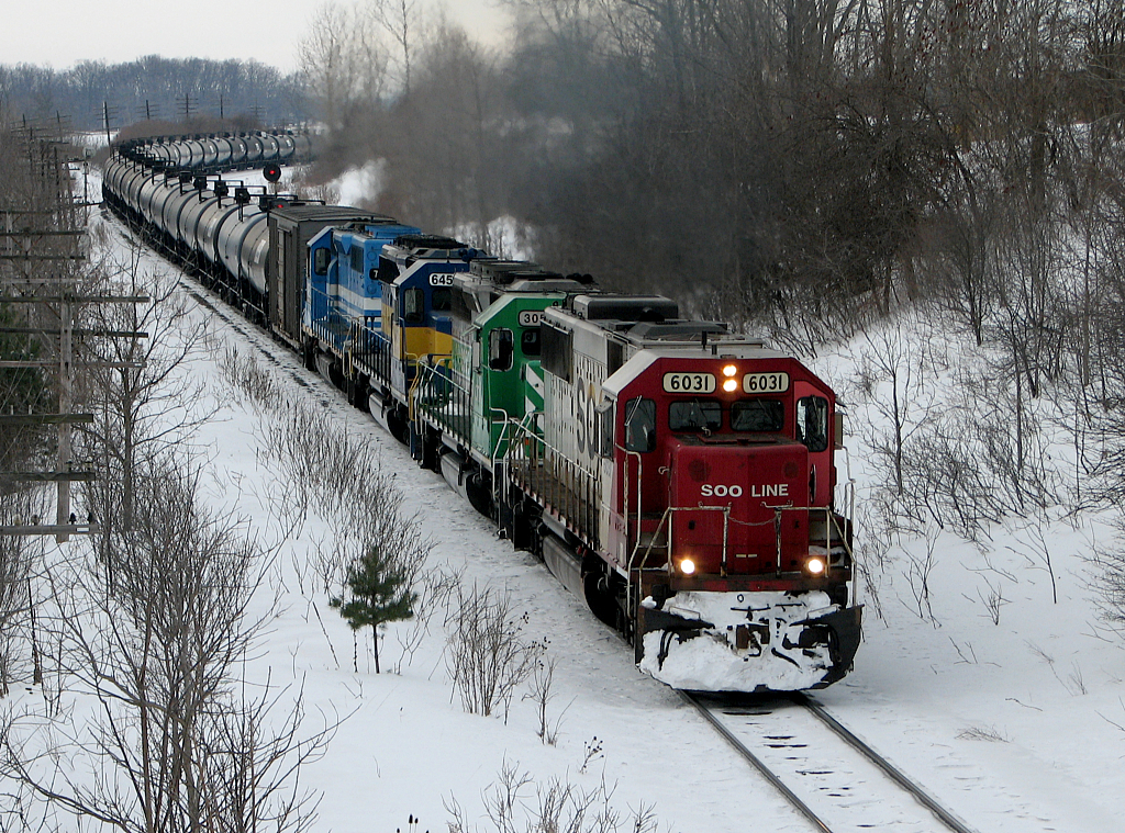 Railpictures.ca - RLHH3403 Photo: CP 642 with a colourful lashup highballs through Lobo towards ...