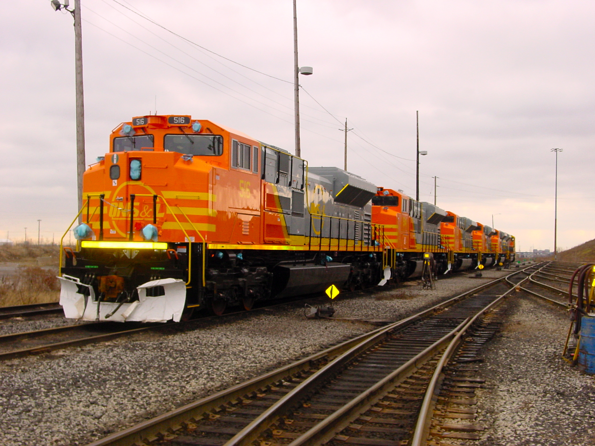 Railpictures.ca - Phil Hall Photo: QNS&L SD70ACe’s sit at Mac Yard awaiting forwarding to their ...