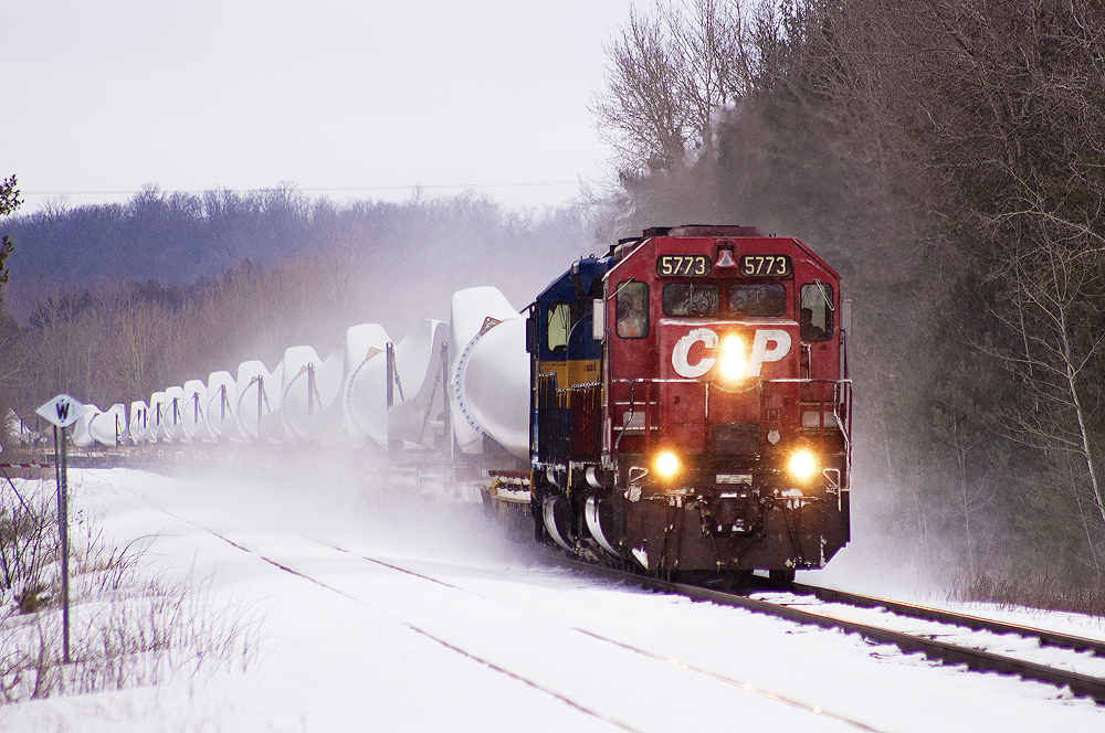 Railpictures.ca - Michael Delic Photo: A beater SD40-2 leads CP DIM-005; a unit train of ...