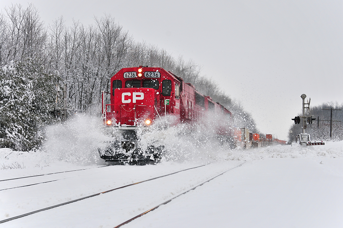 Railpictures.ca - Nicolas Houde Photo: By a beautiful winter day, CP 143 is plowing some snow on ...