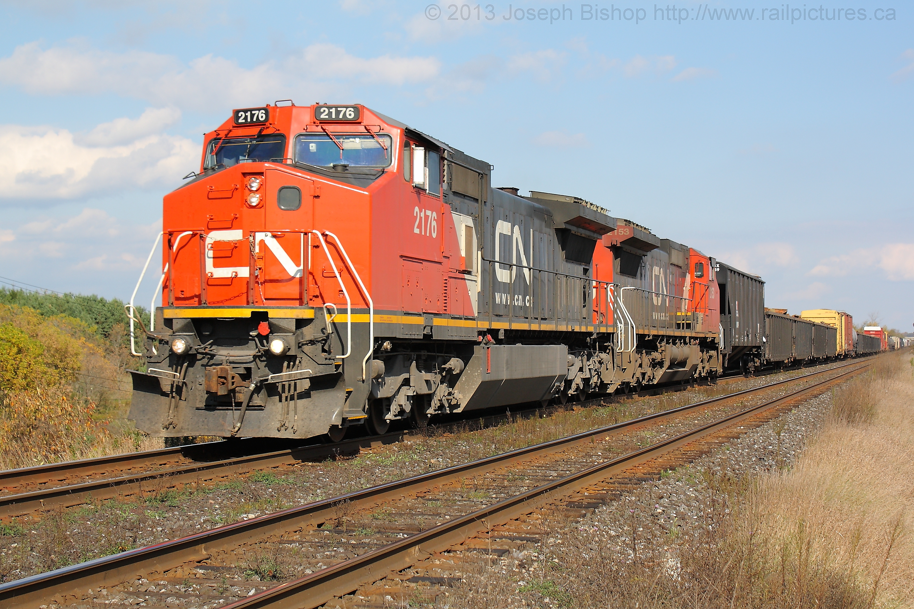 Railpictures.ca - Joseph Bishop Photo: CN 331 flies towards the crossing at Powerline Road with ...
