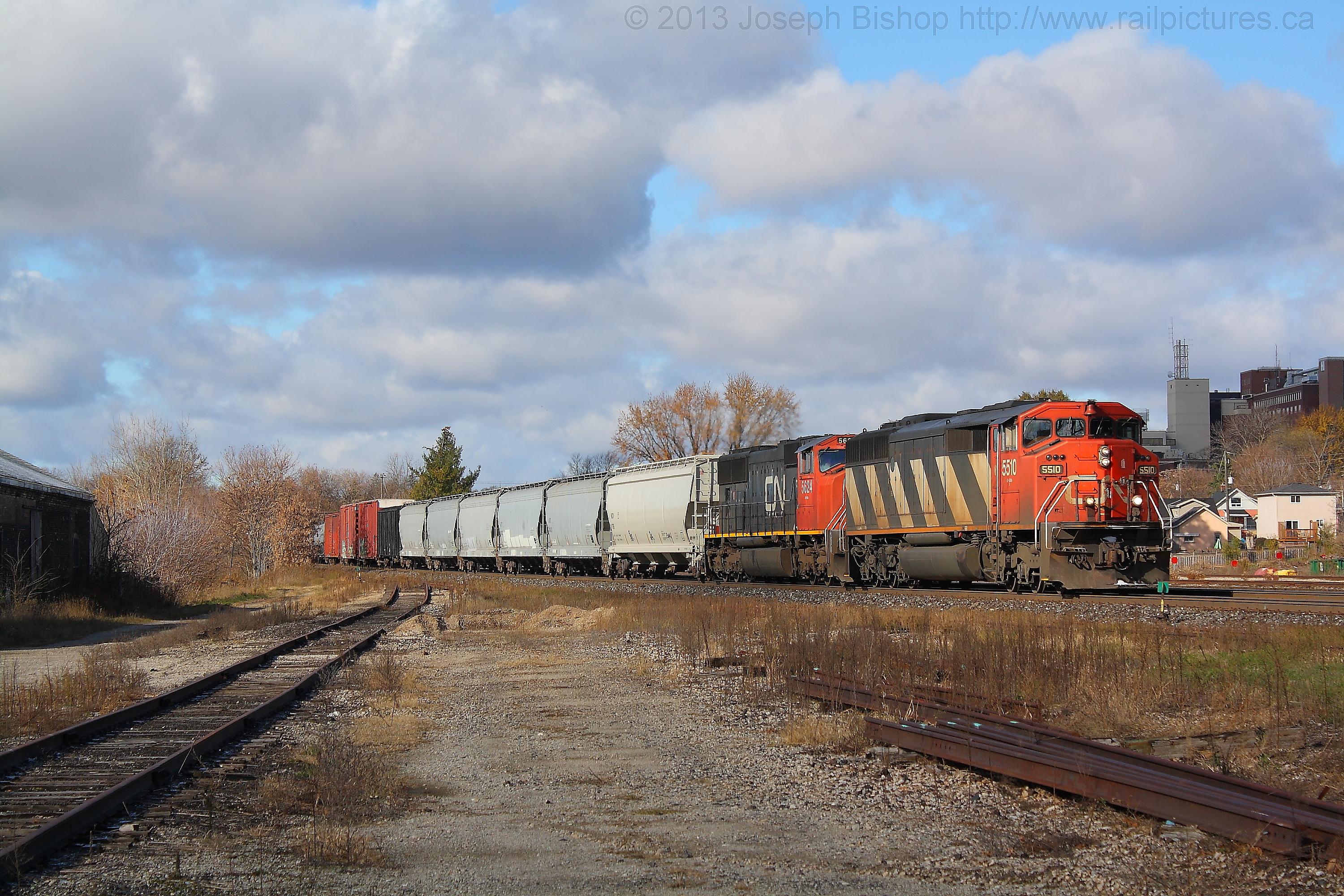 Railpictures.ca - Joseph Bishop Photo: CN 382 rolls through Brantford with a SD60F on the point ...