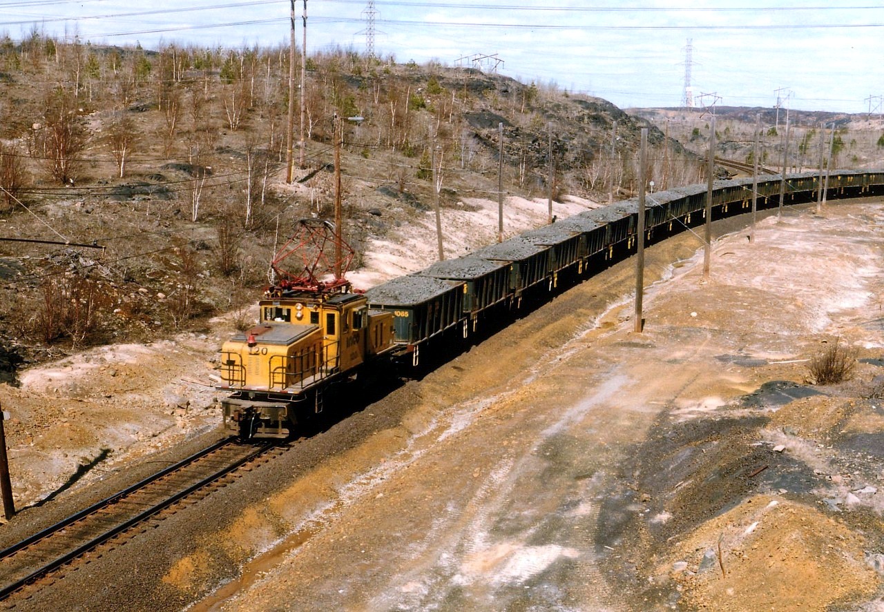 Railpictures.ca - A.W. Mooney Photo: INCO electric #120 is seen with a long string of loads in ...