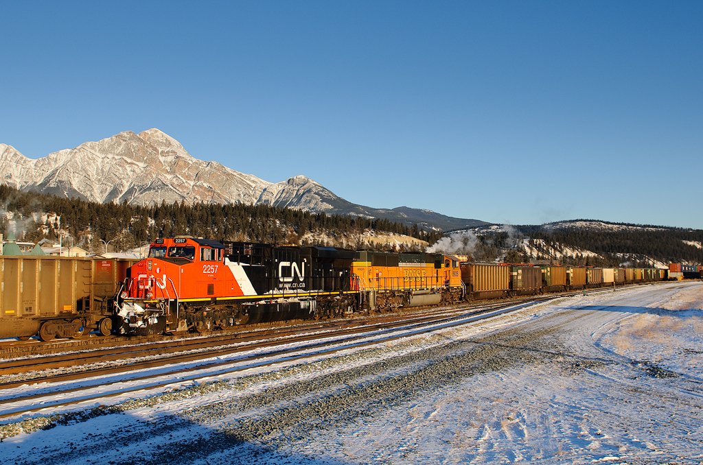 Railpictures.ca - Tim Stevens Photo: CN ES44DC 2257 and BNSF SD70MAC 8935 climb into Jasper with ...