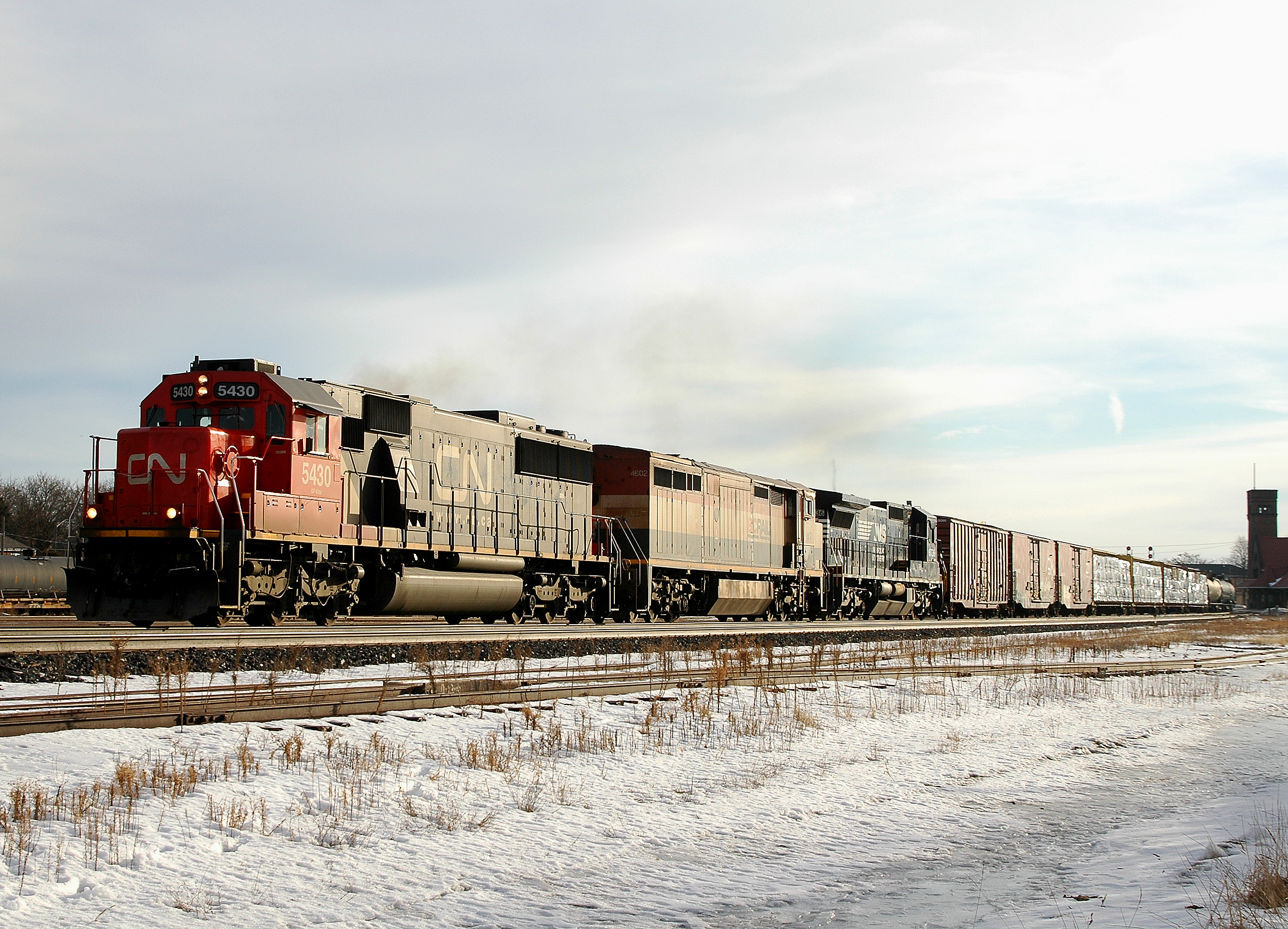 Railpictures.ca - James Gardiner Photo: A late running CN 385 passing brantford with CN 5430 ...