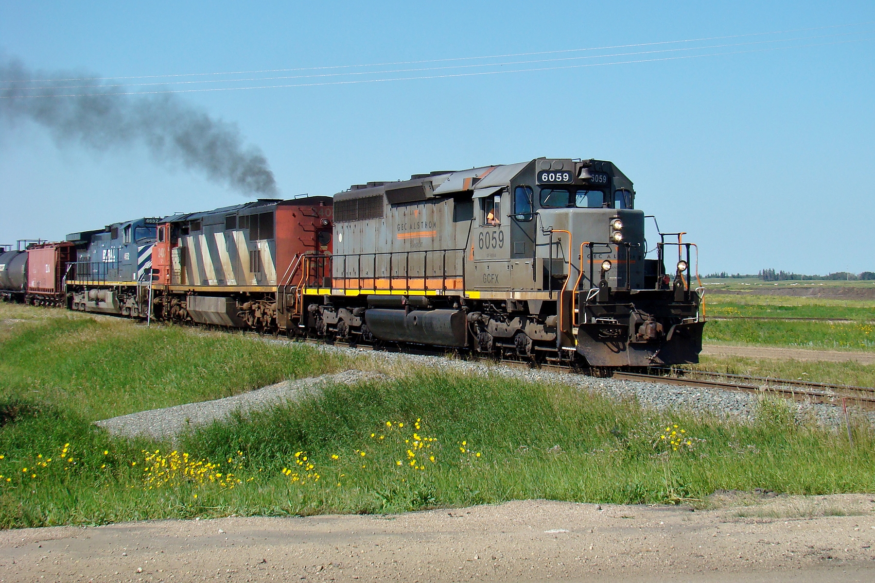 Railpictures.ca - steve arnot Photo: GCFX 6059, CN 2403, and BCOL 4652 depart from Scotford Yard ...