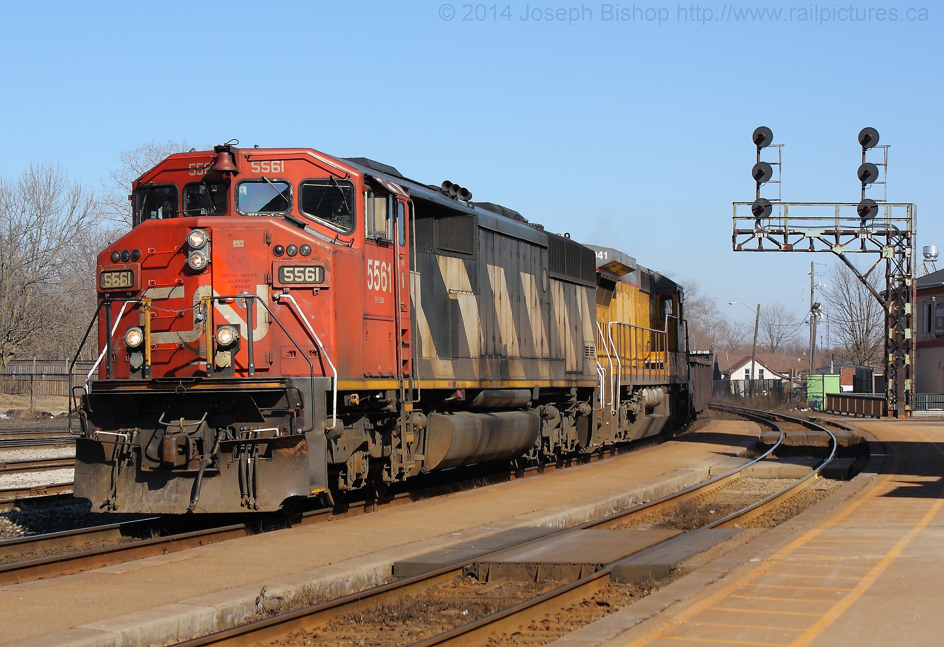 Railpictures.ca - Joseph Bishop Photo: CN 435 comes under the signals at Brantford with CN 5561 ...
