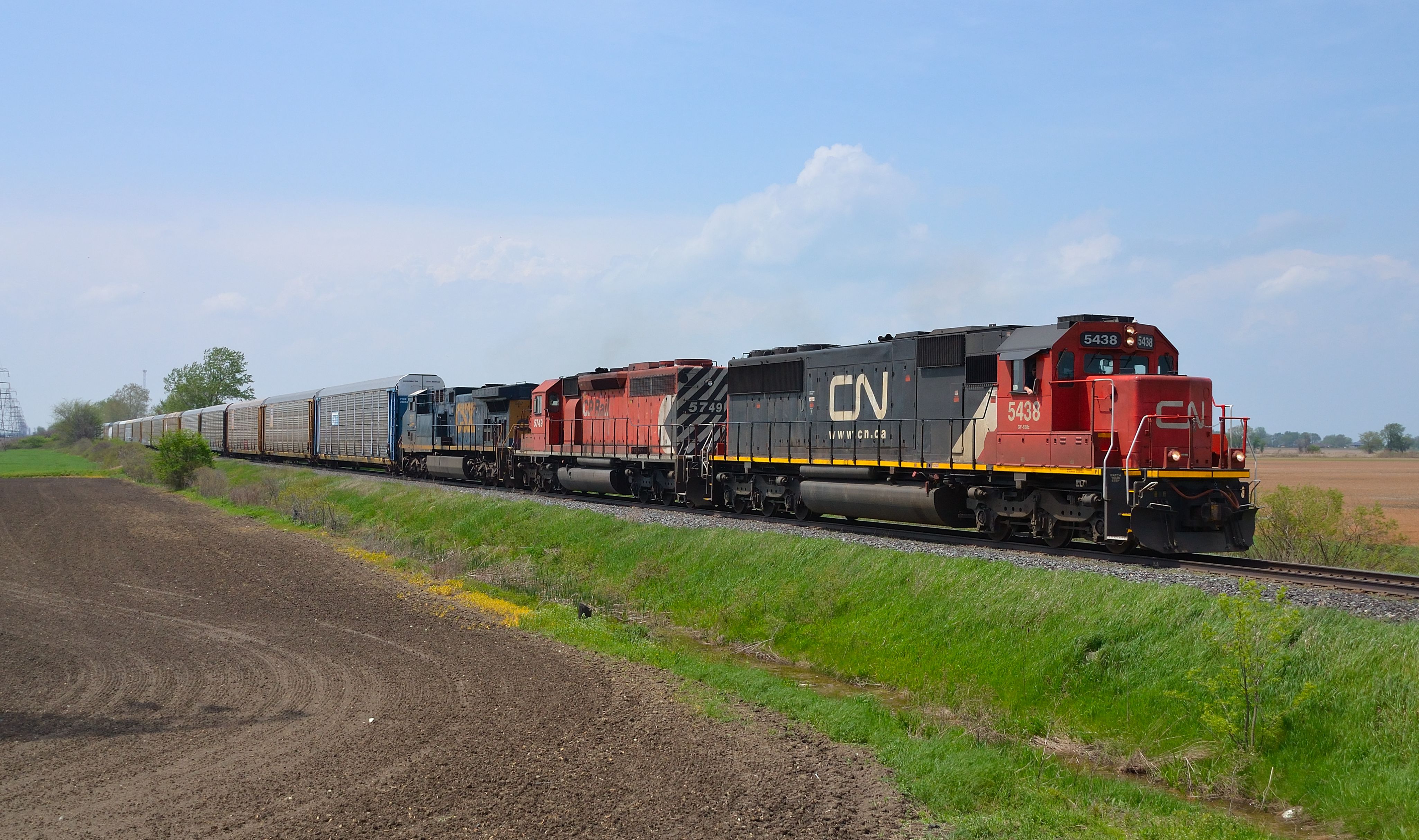 Railpictures.ca - Jay Butler Photo: CP 240 led by CN 5438, CP 5749 and CSXT 567 heads east out ...