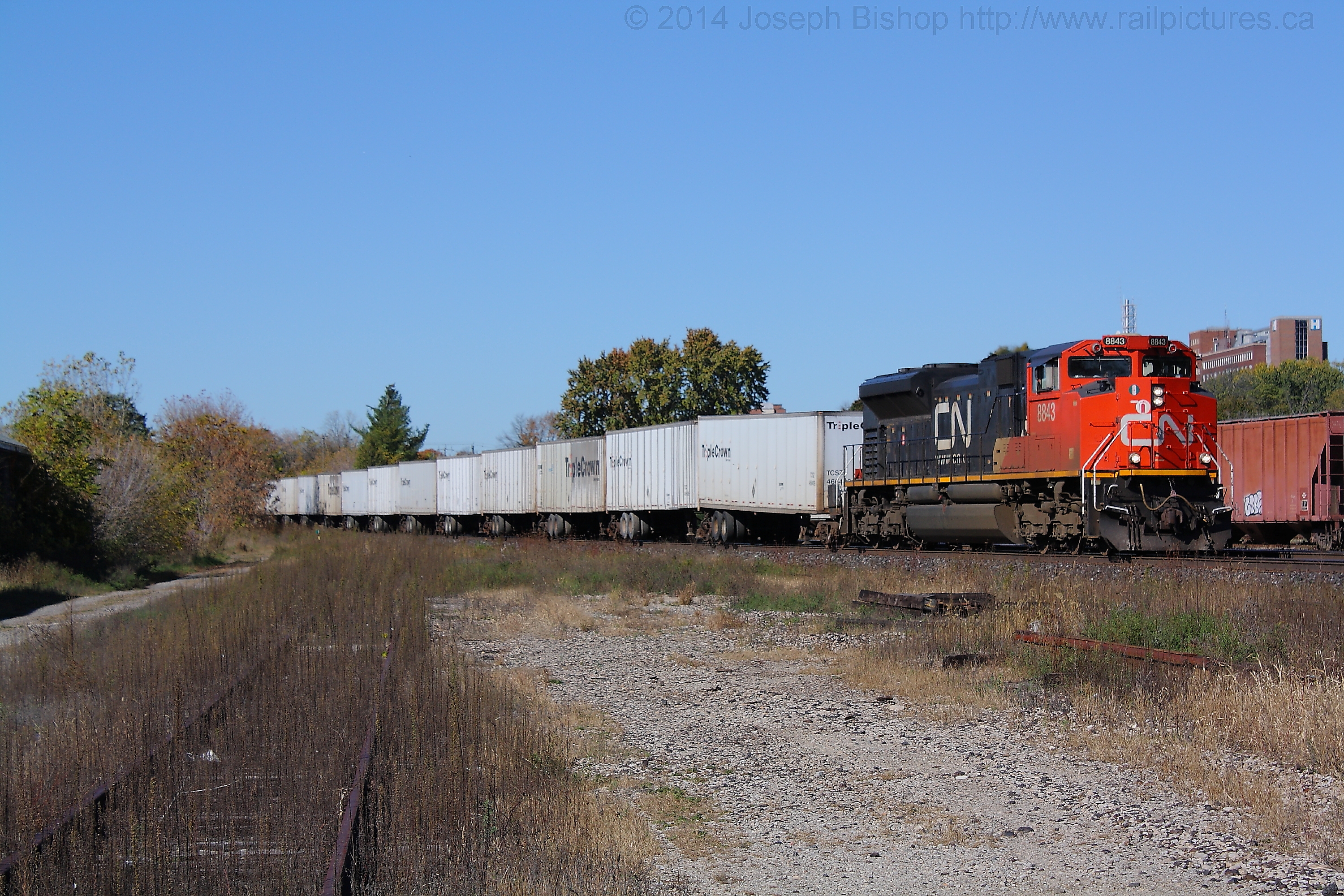 Railpictures.ca - Joseph Bishop Photo: A late running CN 144 slowly limps through Brantford with ...