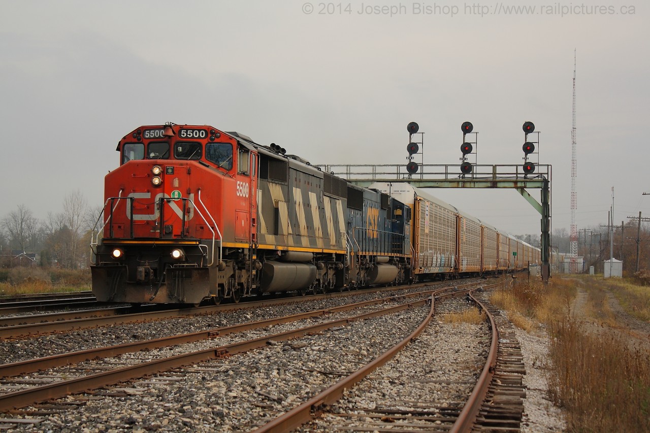 Railpictures.ca - Joseph Bishop Photo: CN 393 is seen cruising under the signal bridge at Paris ...