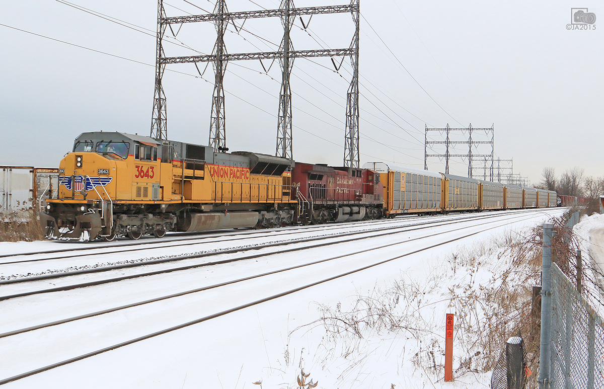 Railpictures.ca - JA Photo: UP 3643, CP 9604 power CP 234, as they slowly creep up to the light ...