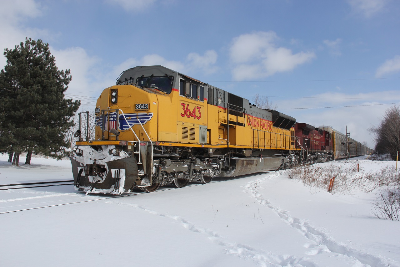 Railpictures.ca - Kevin Flood Photo: CP 235 slowly makes its way west with UP 3643 and CP 9604 ...