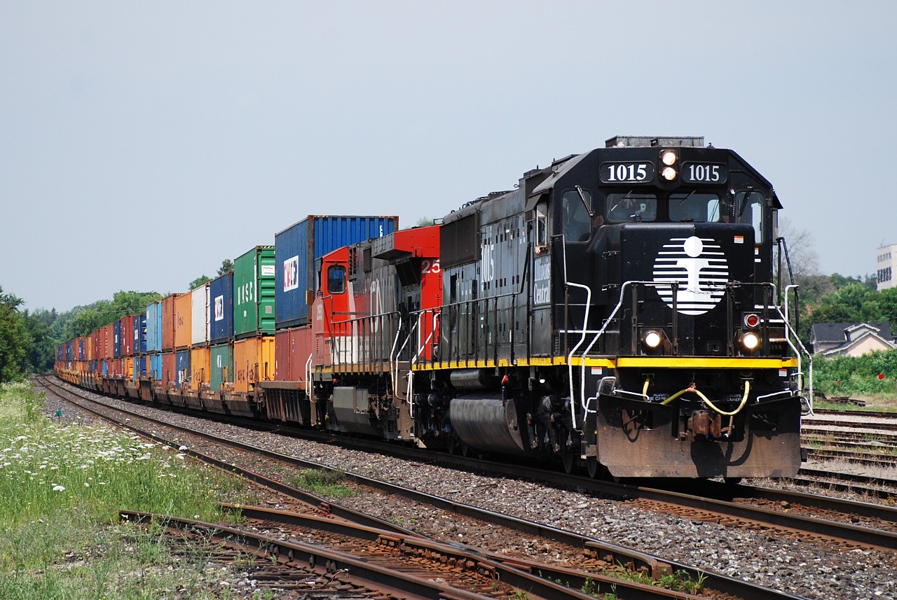 Railpictures.ca - Rob Smith Photo: Very clean IC 1015 leads 148 on a hot and hazy summer day ...