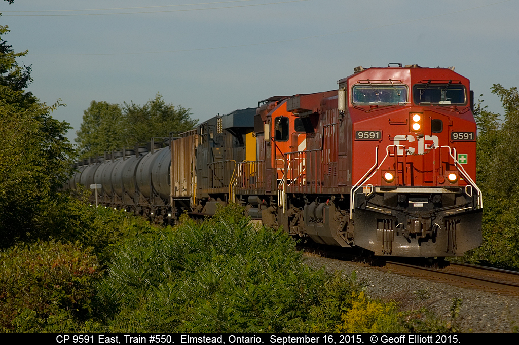 Railpictures.ca - Geoff Elliott Photo: CP 9591 has an old SD40-2 Soldier and a CSX GEVO in tow ...