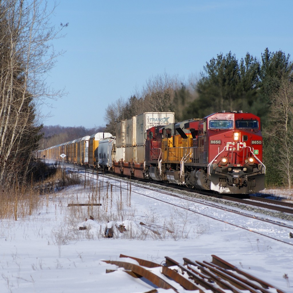 Railpictures.ca - Jordan Michael Photo: CP 8650 is seen blasting trough Essa (Mile 59) with UP ...