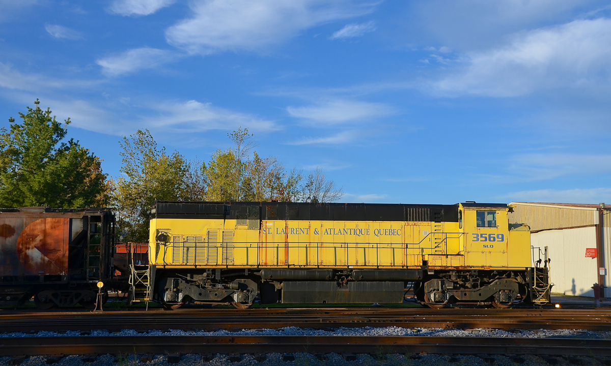 Railpictures.ca - Michael Berry Photo: M420W broadside. Ex-CN M420W SLQ 3569 is seen at Exporail ...