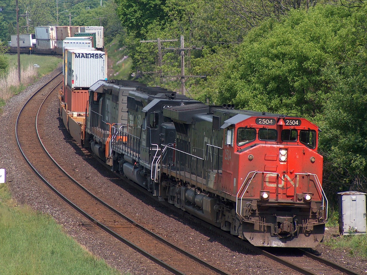 Railpictures.ca - Kevin Flood Photo: CN 148 with wide cab CN 2504 leading an IC unit, and one of ...