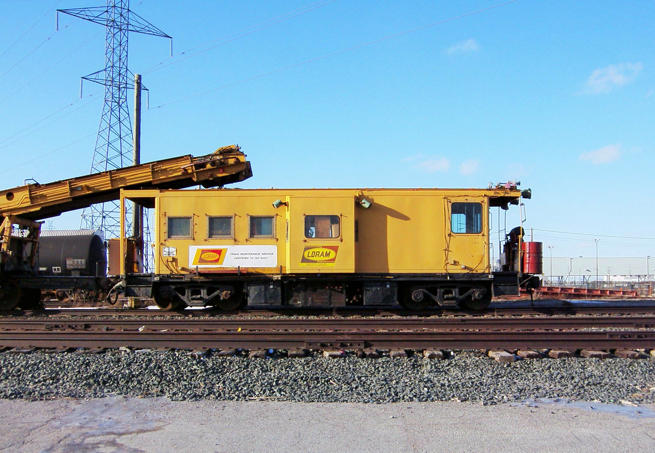 Railpictures.ca - Paul Santos Photo: Loram rail grinding train was parked by the General Motors ...