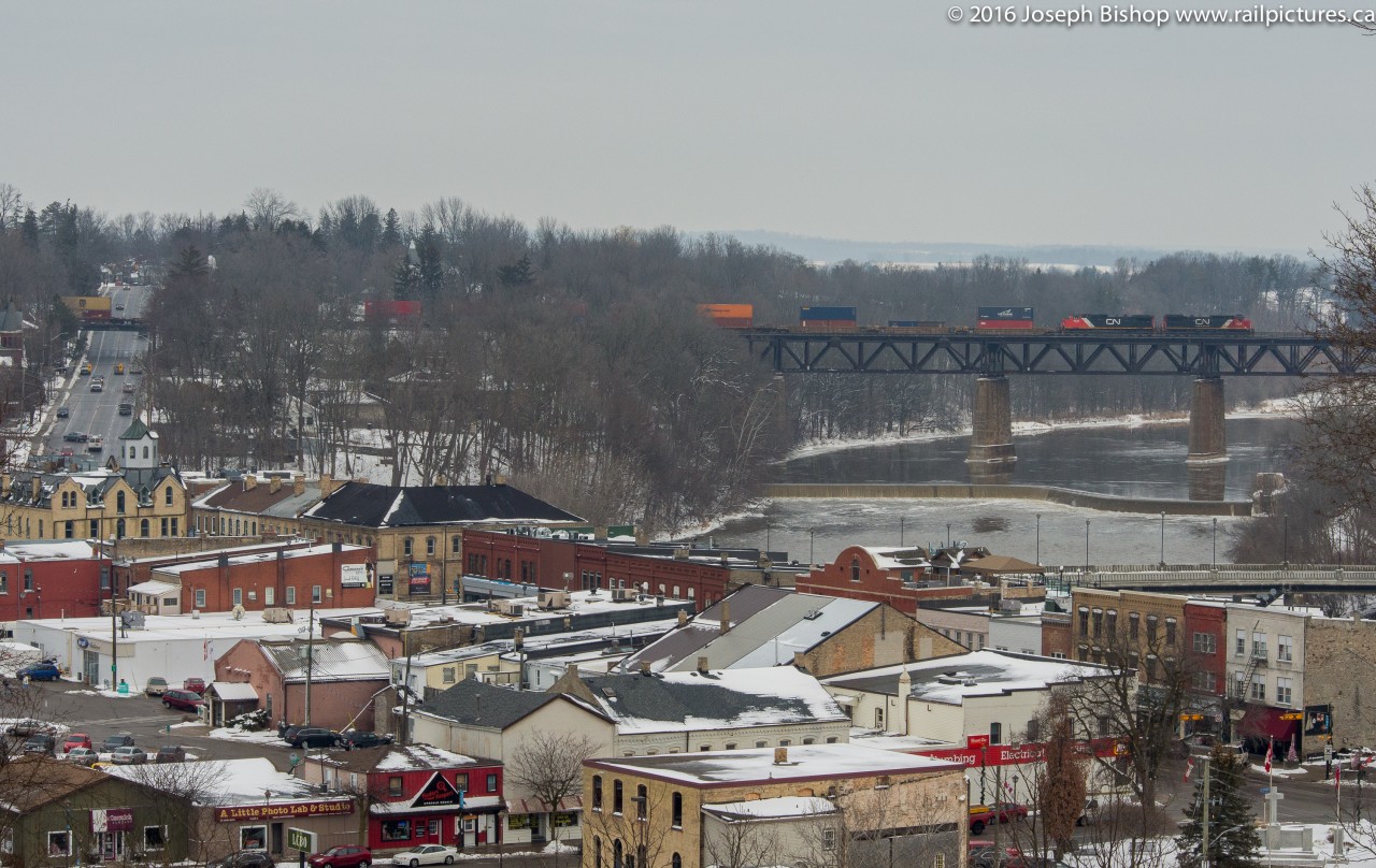 Railpictures.ca - Joseph Bishop Photo: CN 148 is pictured passing high above the Grand River and ...