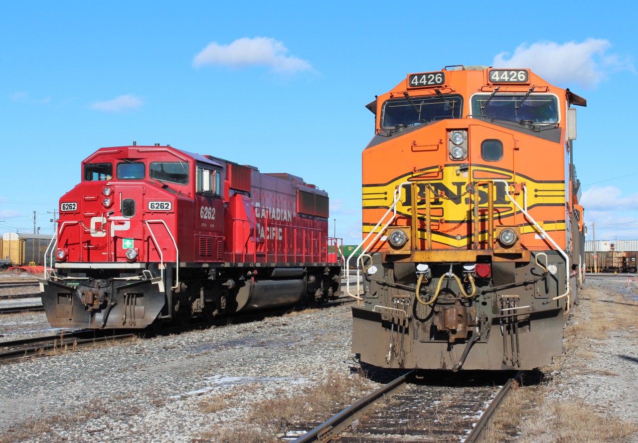 Railpictures.ca - Paul Santos Photo: BNSF Dash9-44CW poses with CP SD60M as it waits it’s turn ...