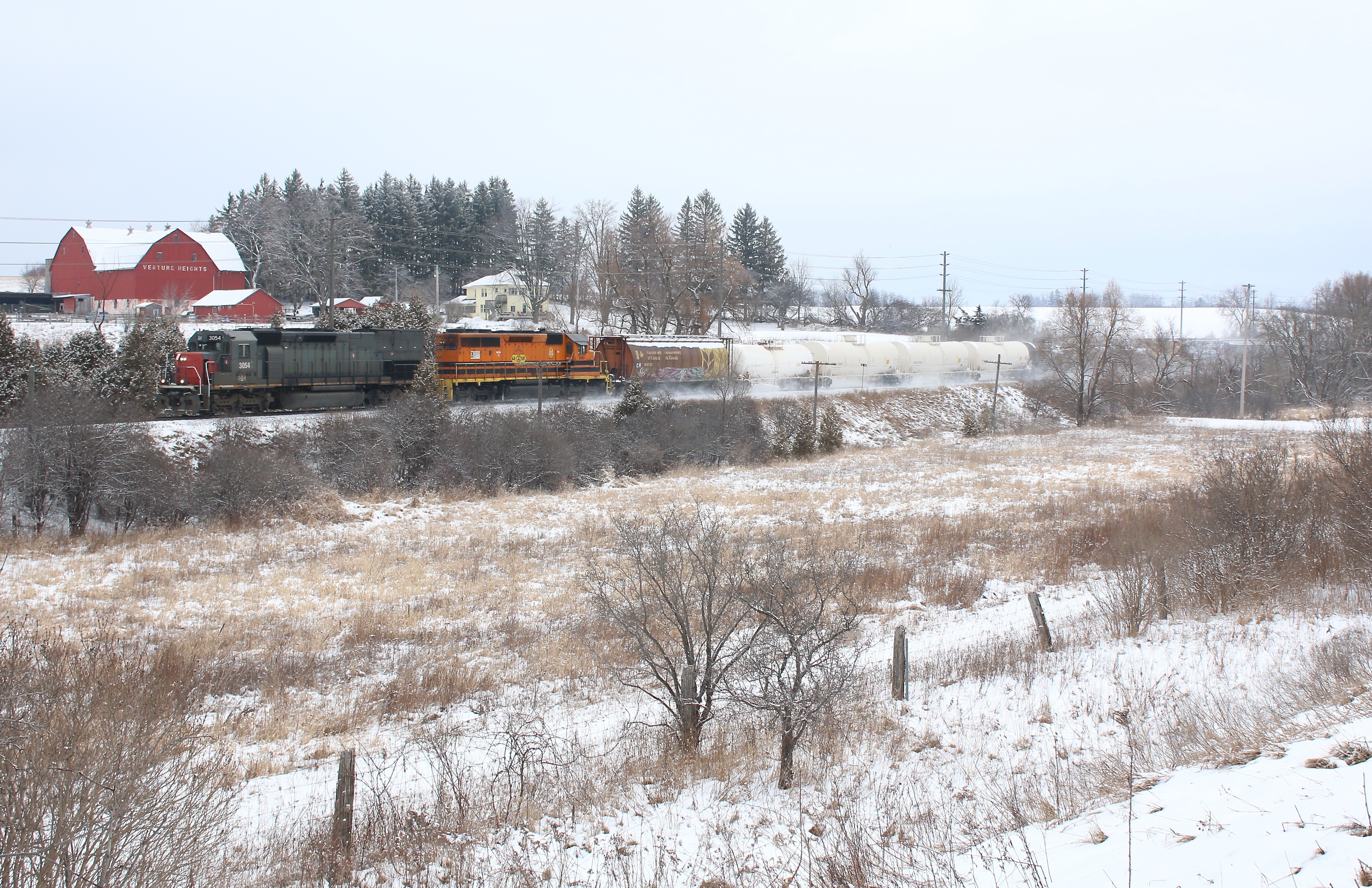 Railpictures.ca - Marcus W Stevens Photo: GEXR train 431 is seen kicking up fresh snow as it ...