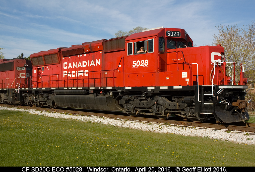 Railpictures.ca - Geoff Elliott Photo: SD30C-ECO #5028 sits as train T28 (CSX Grain Train) on ...