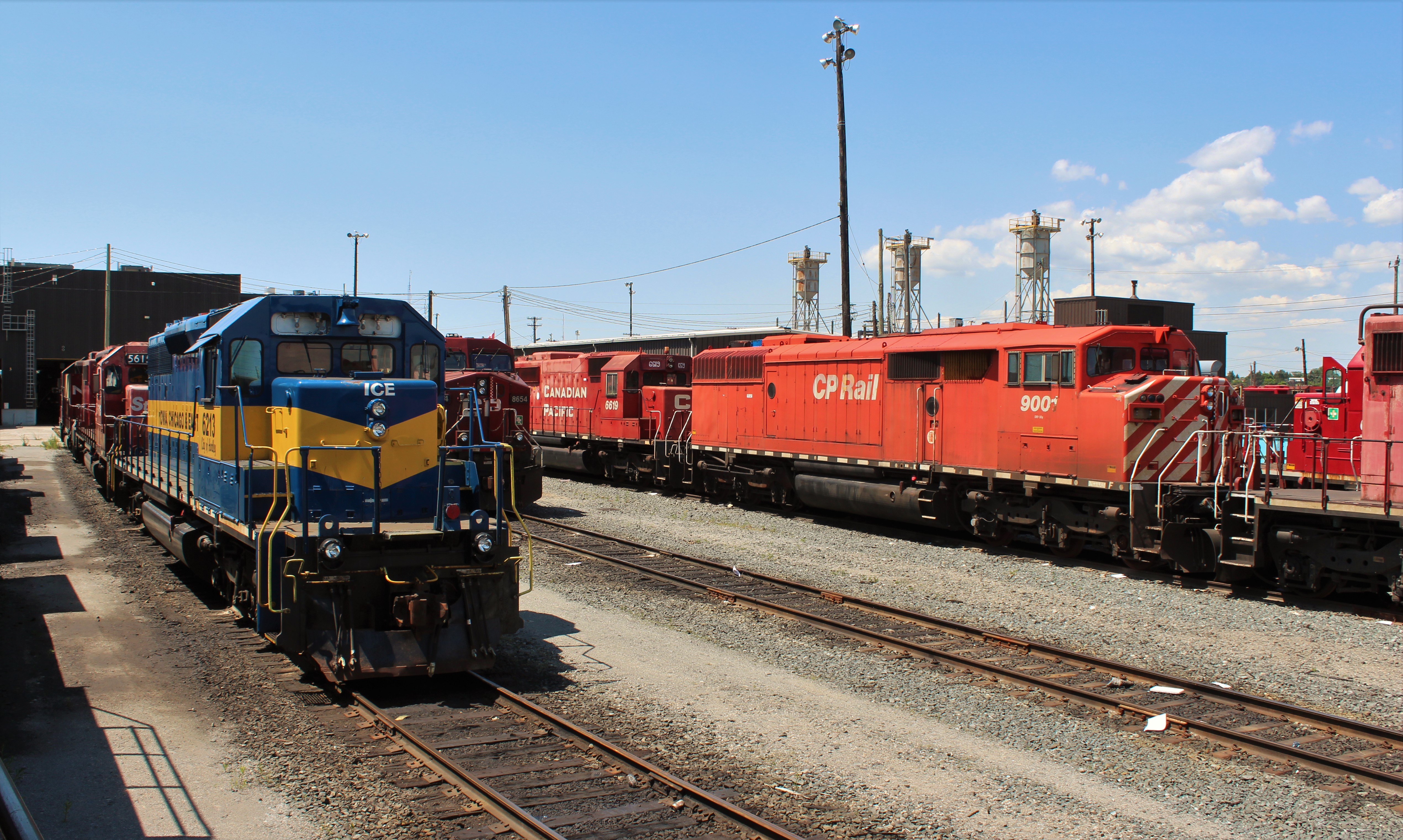 Railpictures.ca - Paul Santos Photo: Here at the east end of the shop we see red barn 9001 ...