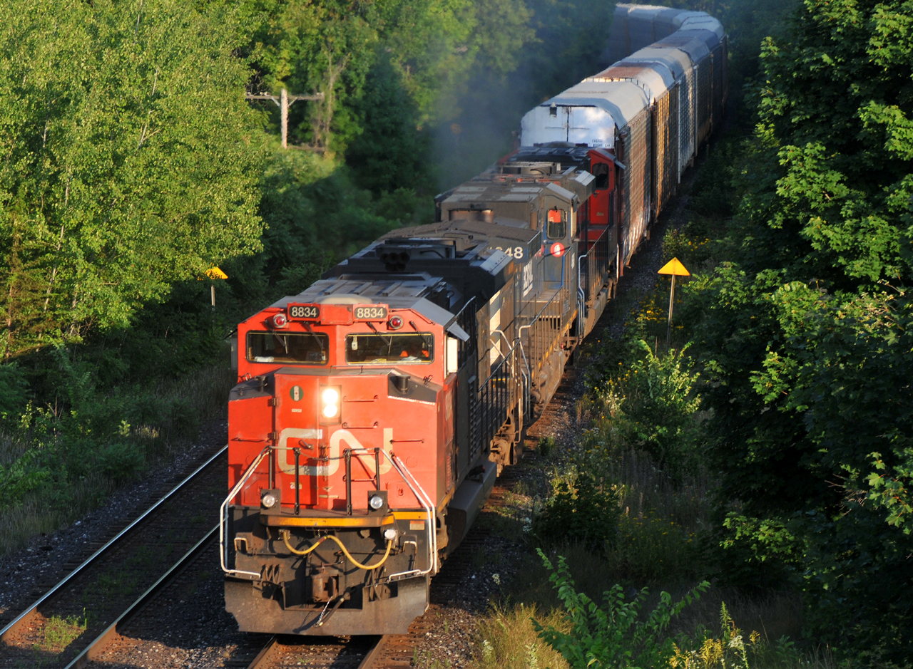 Railpictures.ca - James Gardiner Photo: CN 8834, BCOL 4648, and CN 8805 (not one gevo in sight ...