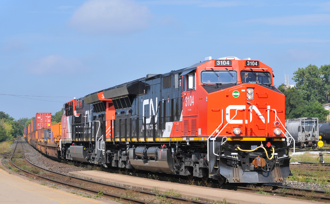 Railpictures.ca - James Gardiner Photo: CN 3104 – CN 3102 lead Q14891 06 through Brantford with ...