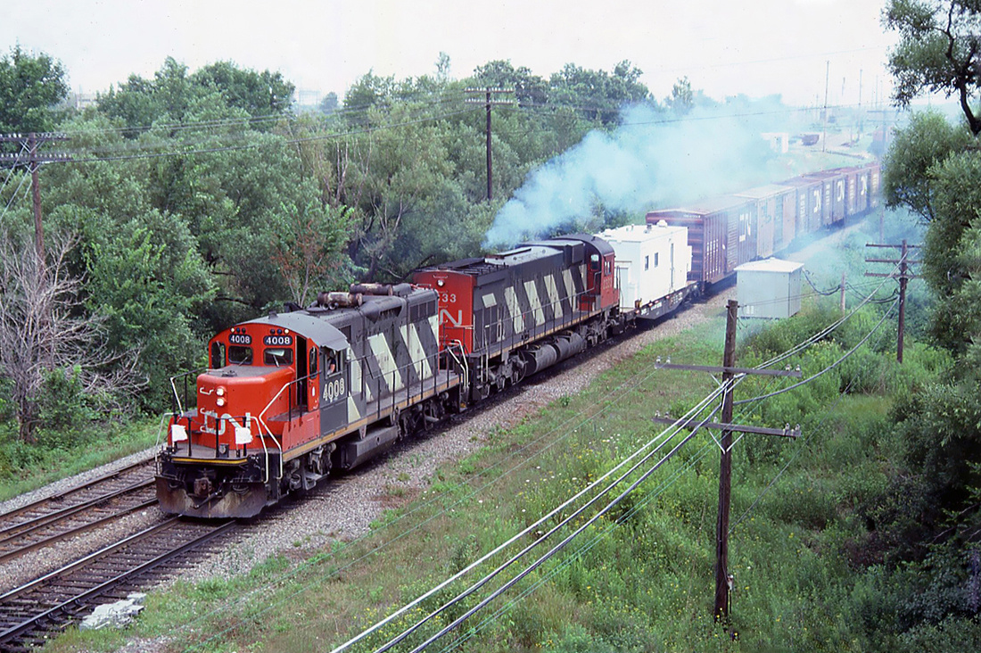 Railpictures.ca - Roger Lalonde Photo: CN GMD GP9u 4008 with MLW M-636 2333. | Railpictures.ca ...
