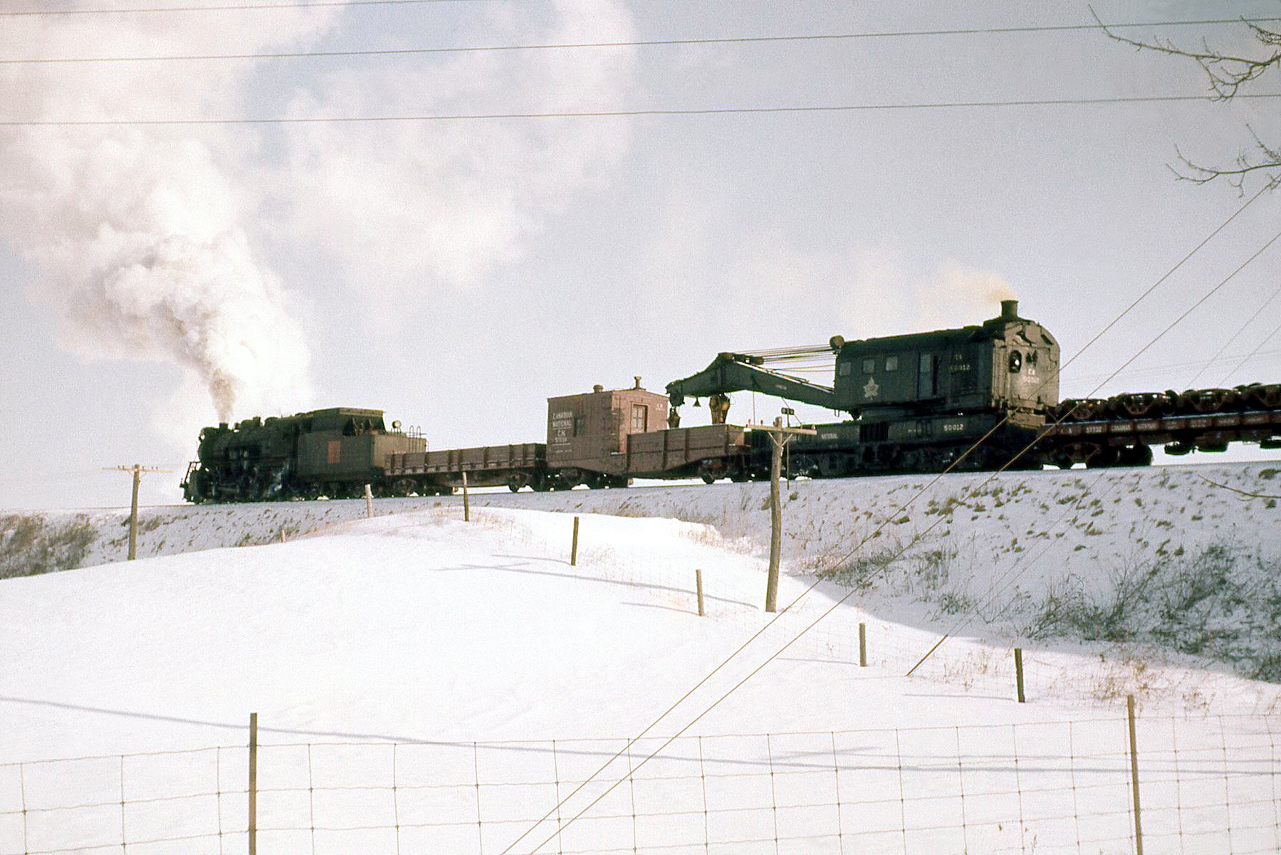 Railpictures.ca - Bill Thomson Photo: A Canadian National auxiliary train heads north on the ...