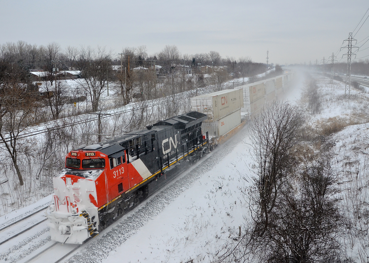 Railpictures.ca - Michael Berry Photo: Grain train CN 878 has 20 intermodal platforms on the ...