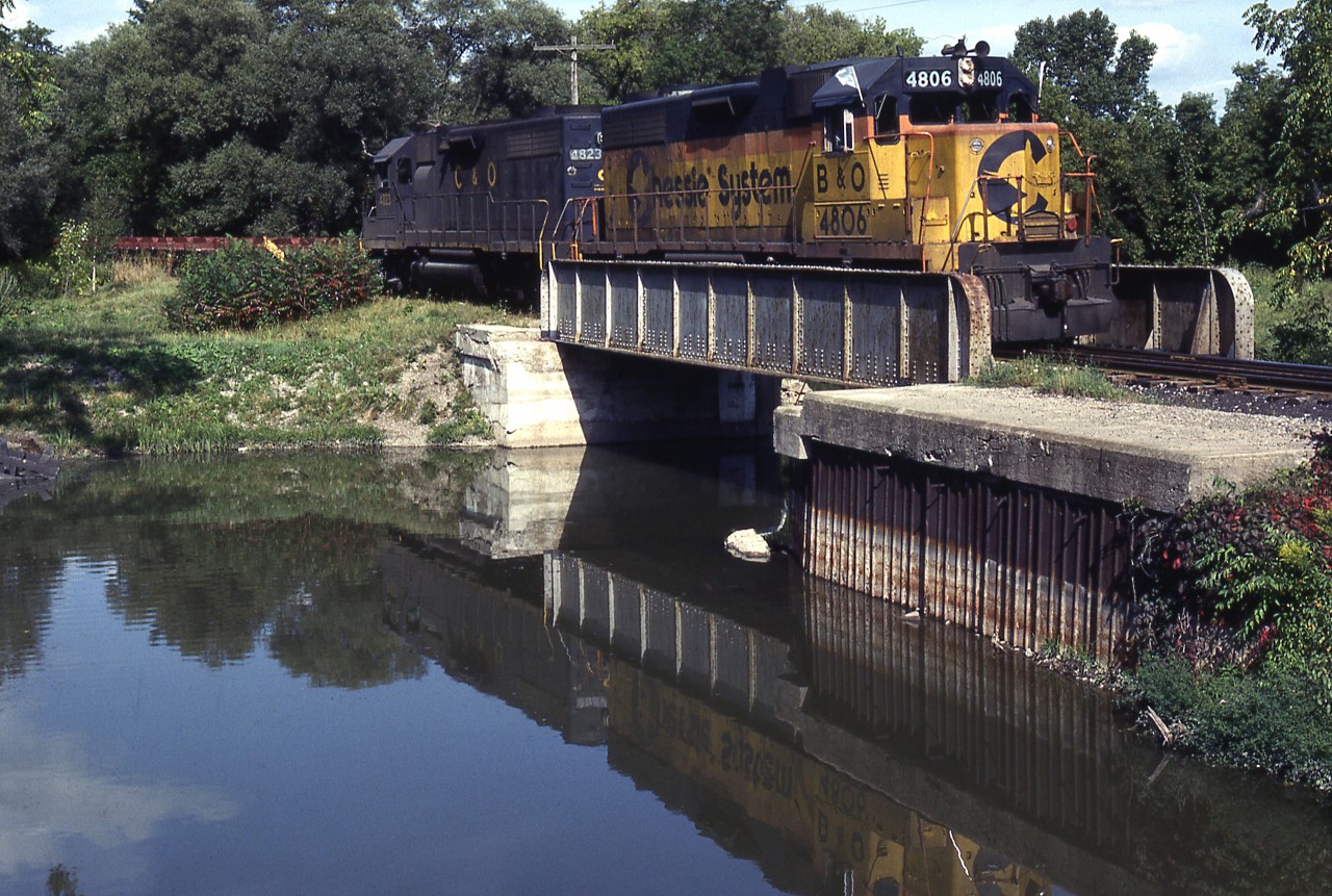 Railpictures.ca - Bruce Mercer Photo: With leased GP38′s reflecting in the water, Extra B&O 4806 ...