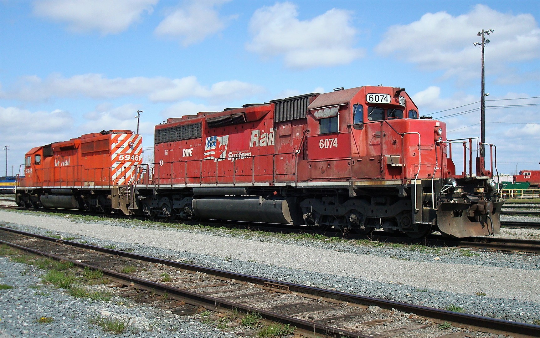 Railpictures.ca - Paul Santos Photo: DME 6074 (ex CP SD40 5549) and CP 5946 an SD40-2 wait ...