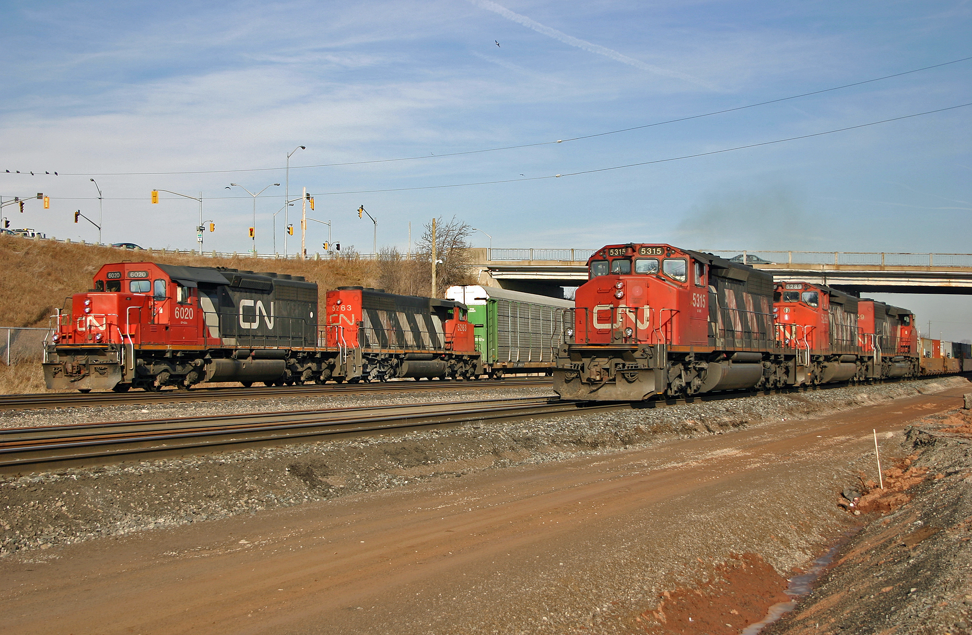 Railpictures.ca - Rob Eull Photo: 393 is performing a lift in the yard at Aldershot with CN 6020 ...