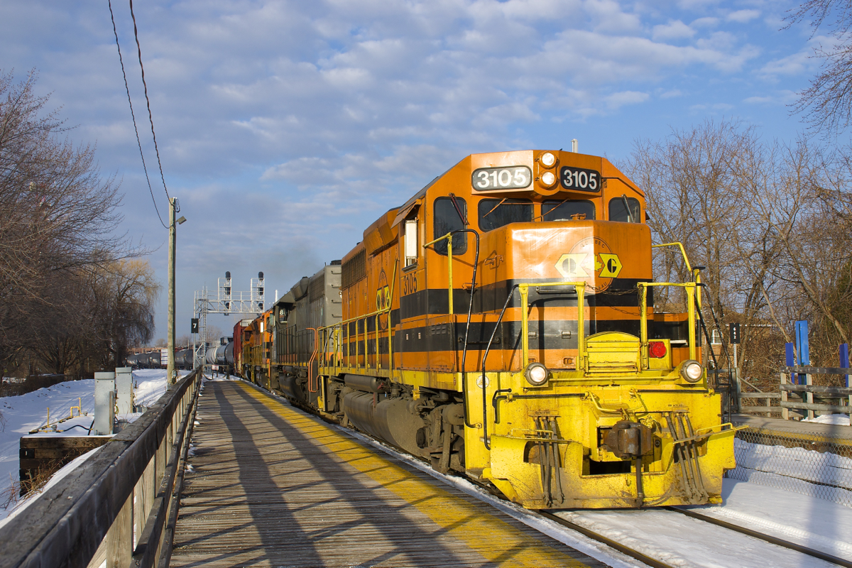 Railpictures.ca - Michael Berry Photo: QGRY 3105, QGRY 6908, SLR 805 & SLR 3805 lead SLR 394 ...