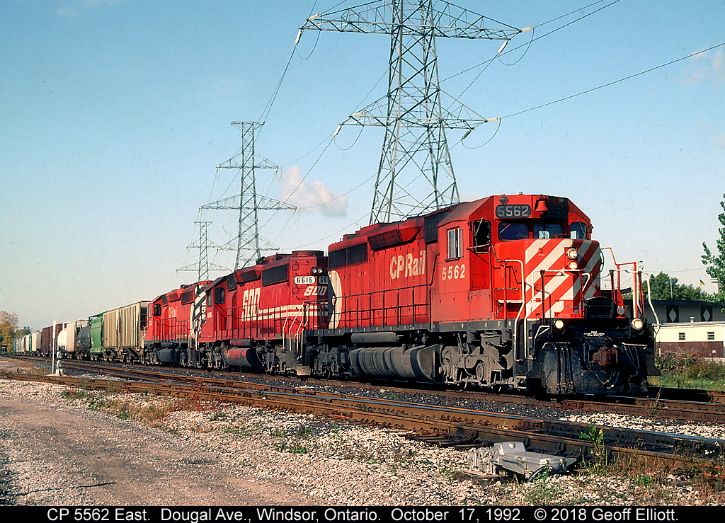 Railpictures.ca - Geoff Elliott Photo: Seeing Red….. CP SD40 #5562 leads a candy apple red SOO ...