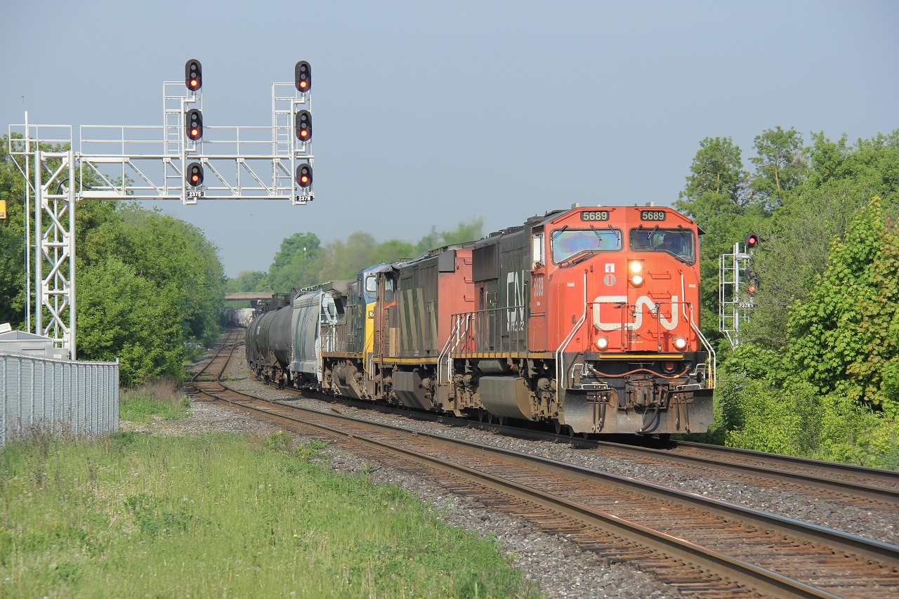 Railpictures.ca - Kevin Flood Photo: A CN eastbound heads through Georgetown on a muggy morning ...