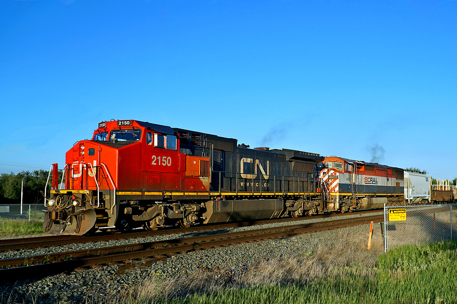 Railpictures.ca - colin arnot Photo: In the evening sun Dash 8-40CW CN 2150 (ex BNSF 830) and ...