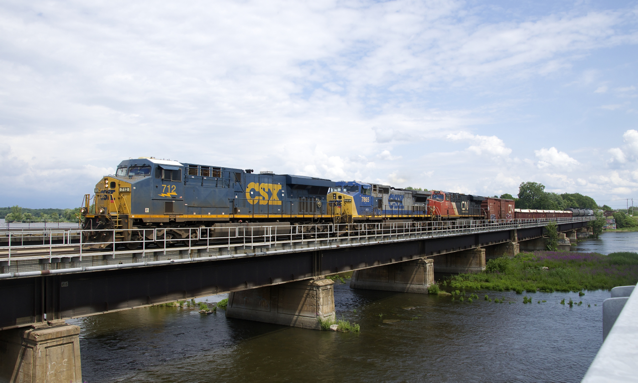 Railpictures.ca - Michael Berry Photo: An 85-car CN 327 is crossing the Ottawa River with CSXT ...