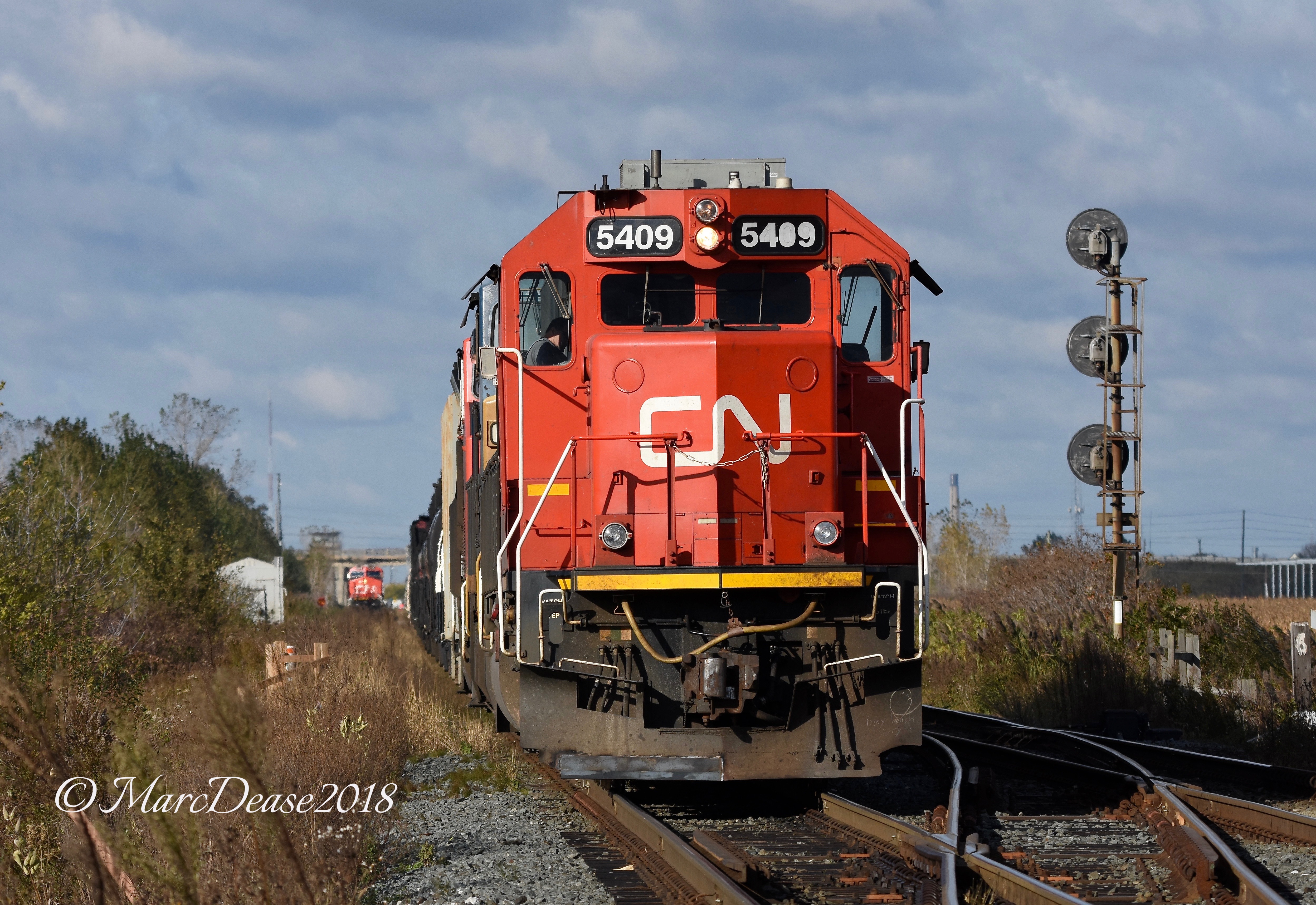 Railpictures.ca - Marc Dease Photo: CN 5409 with GECX 7325 and CN 3047 shove train 394 back into ...