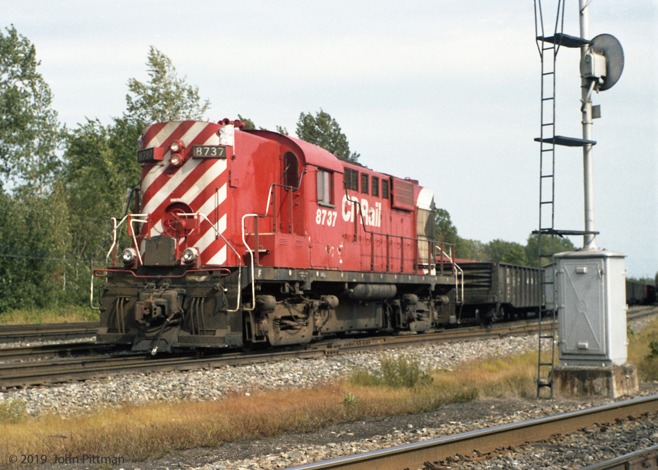 Railpictures.ca - John Pittman Photo: Sitting in the yard at Delson QC is a white flagged extra ...