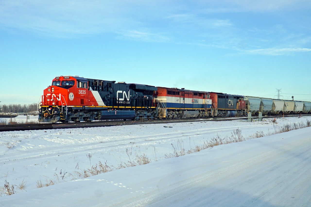 Railpictures.ca - colin arnot Photo: CN 3835, BCOL 4614 and CN 2429 work a train of hopper cars ...