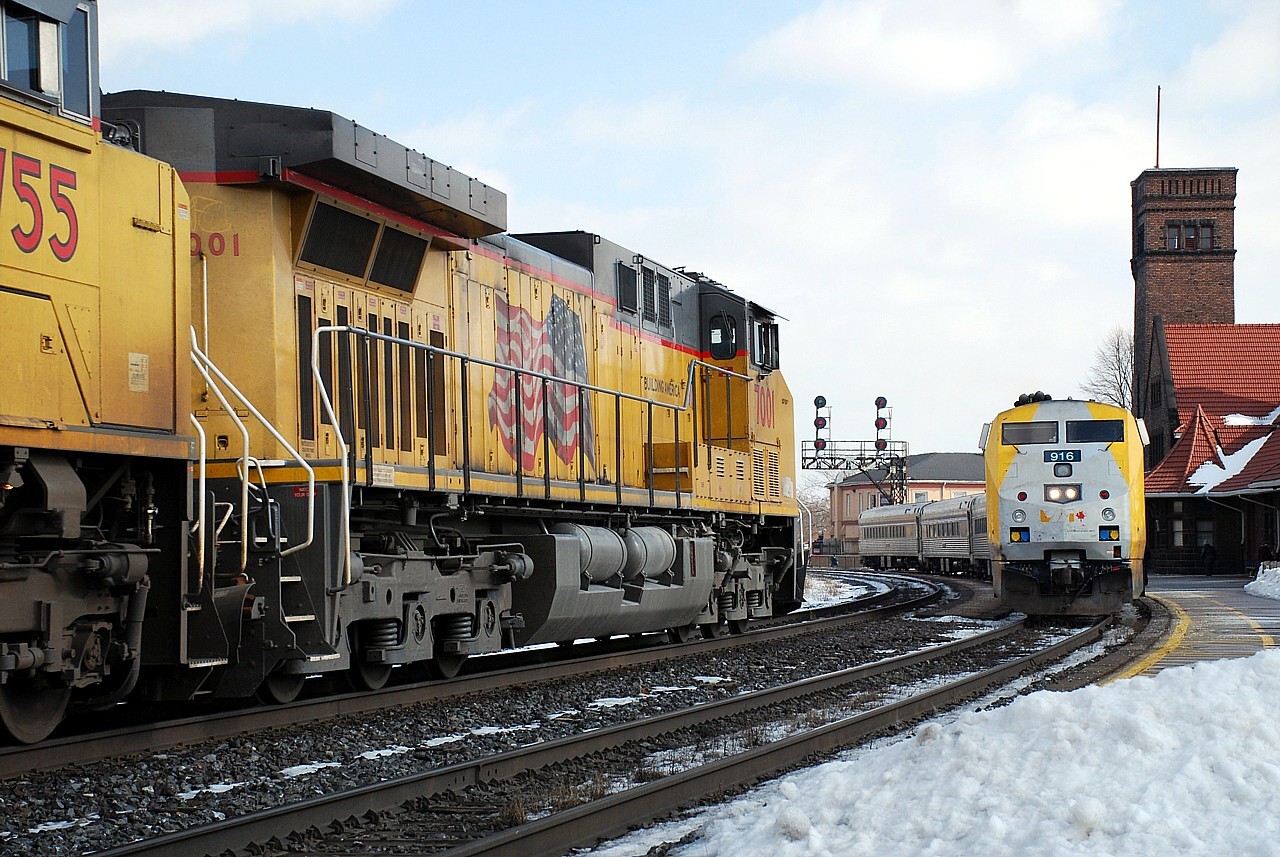 Railpictures.ca - Rob Smith Photo: VIA 73 makes its station stop in Brantford as CN 394 passes ...